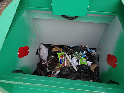 GPC P9 wet waste in compactor - Gradeall International | Waste ...